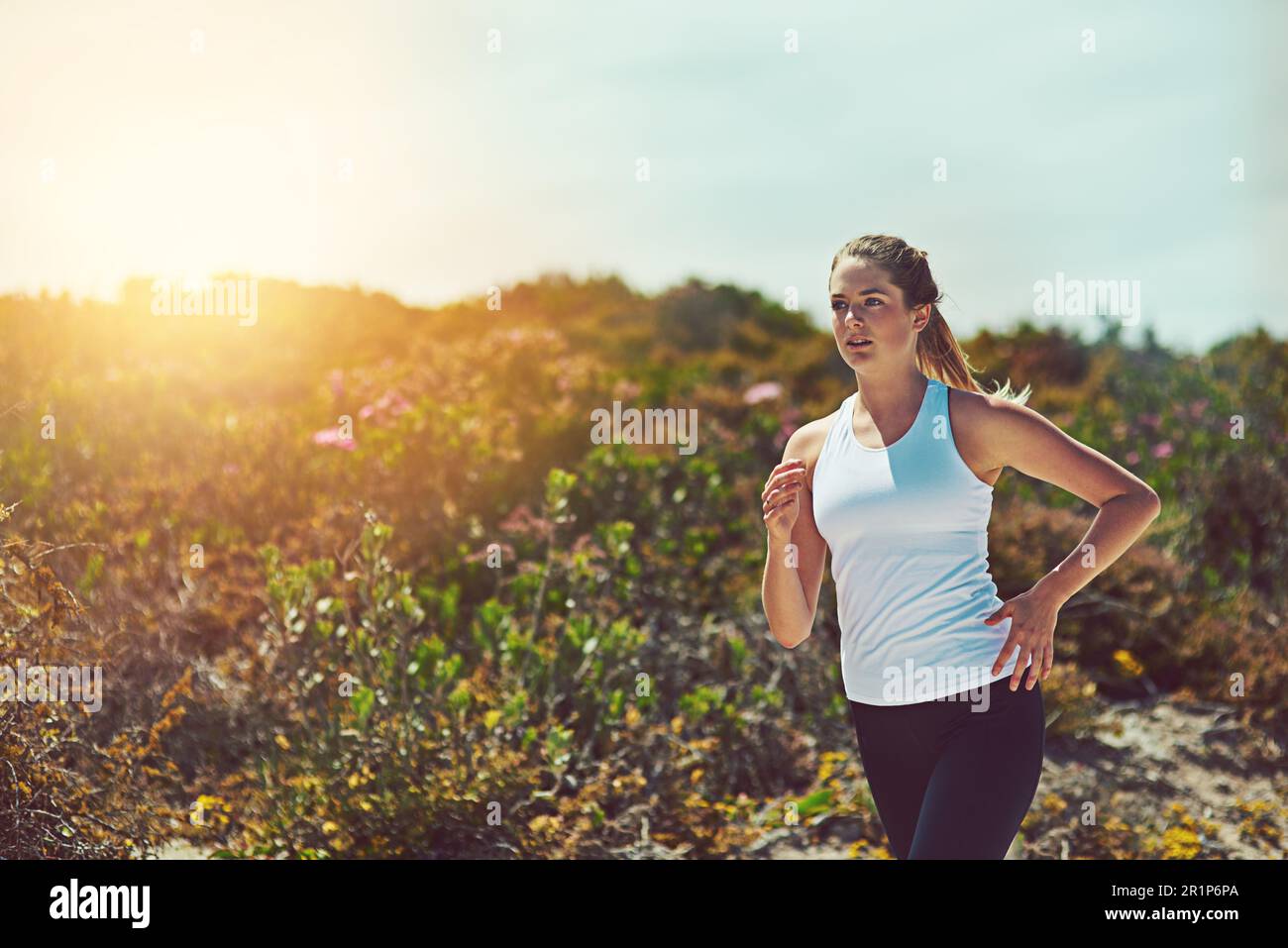 Woman running in nature, fitness outdoor with cardio and training for ...