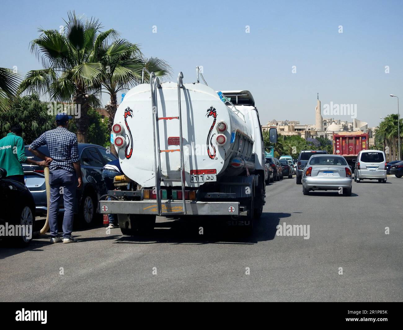 Cairo, Egypt, May 10 2023: A water tanker vehicle with clean water as ...