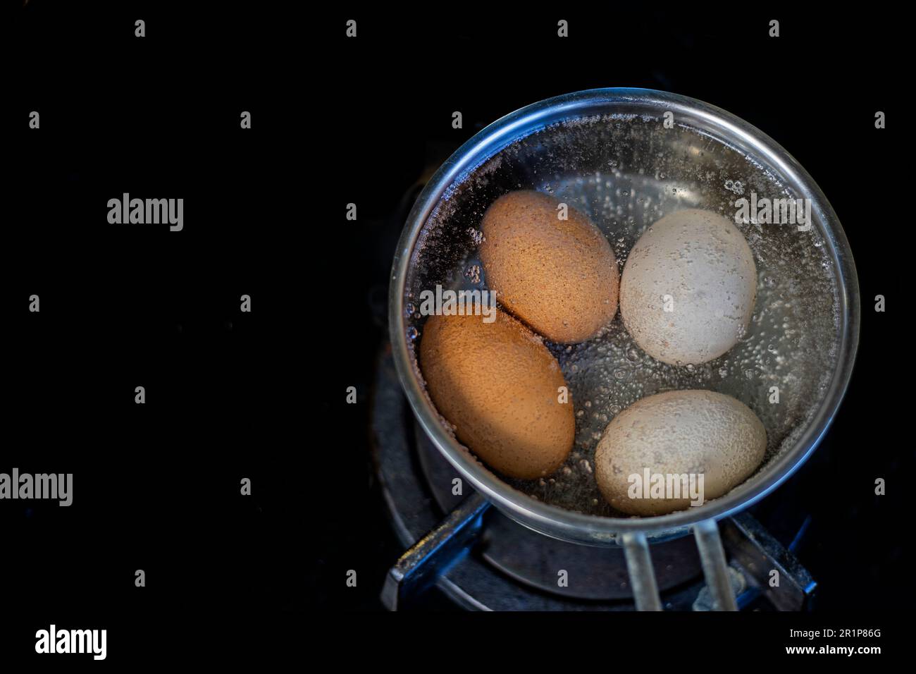 Boiled eggs in saucepan on hi-res stock photography and images - Alamy