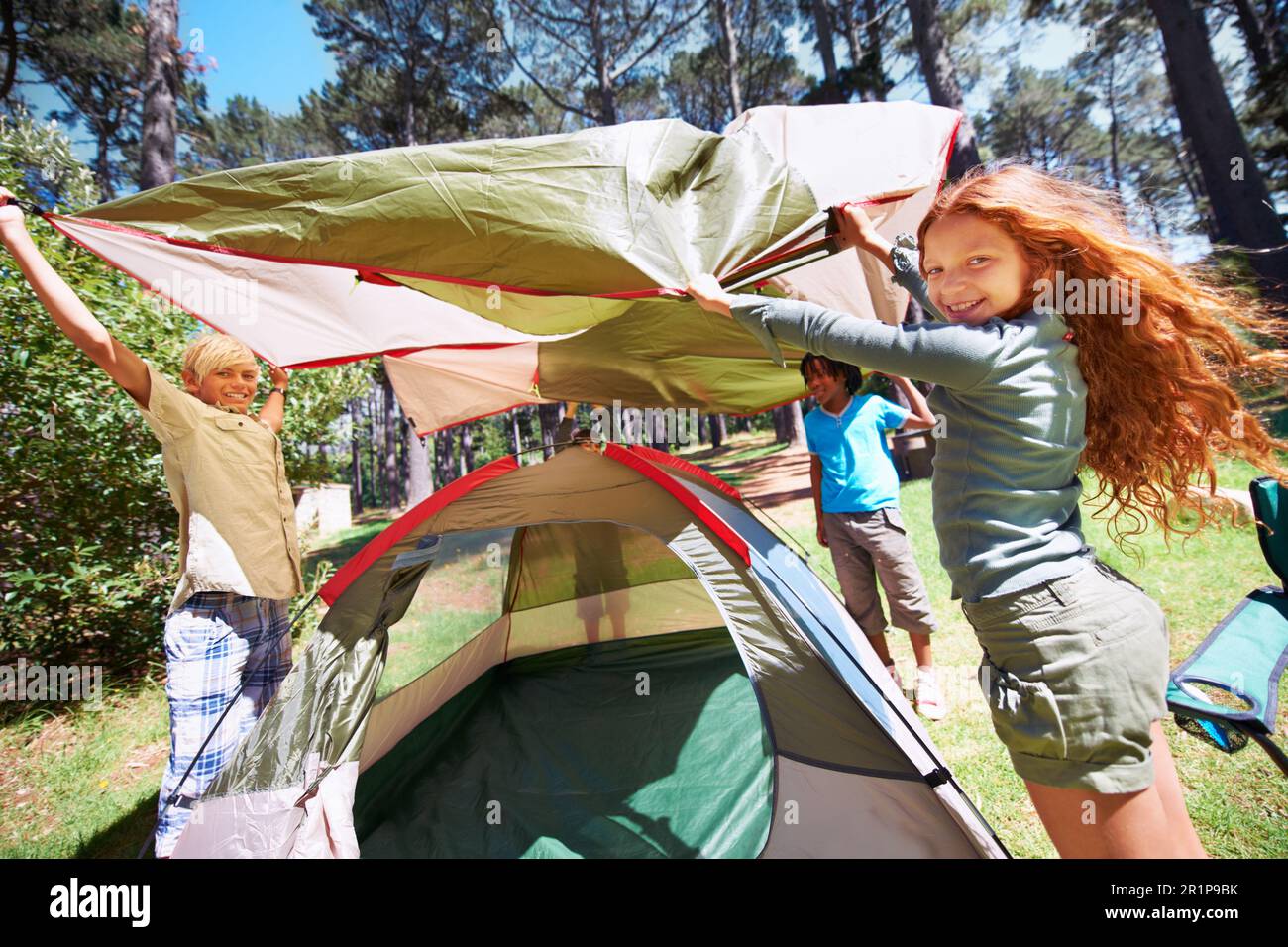 Setting up tent boy and girl hi-res stock photography and images - Alamy