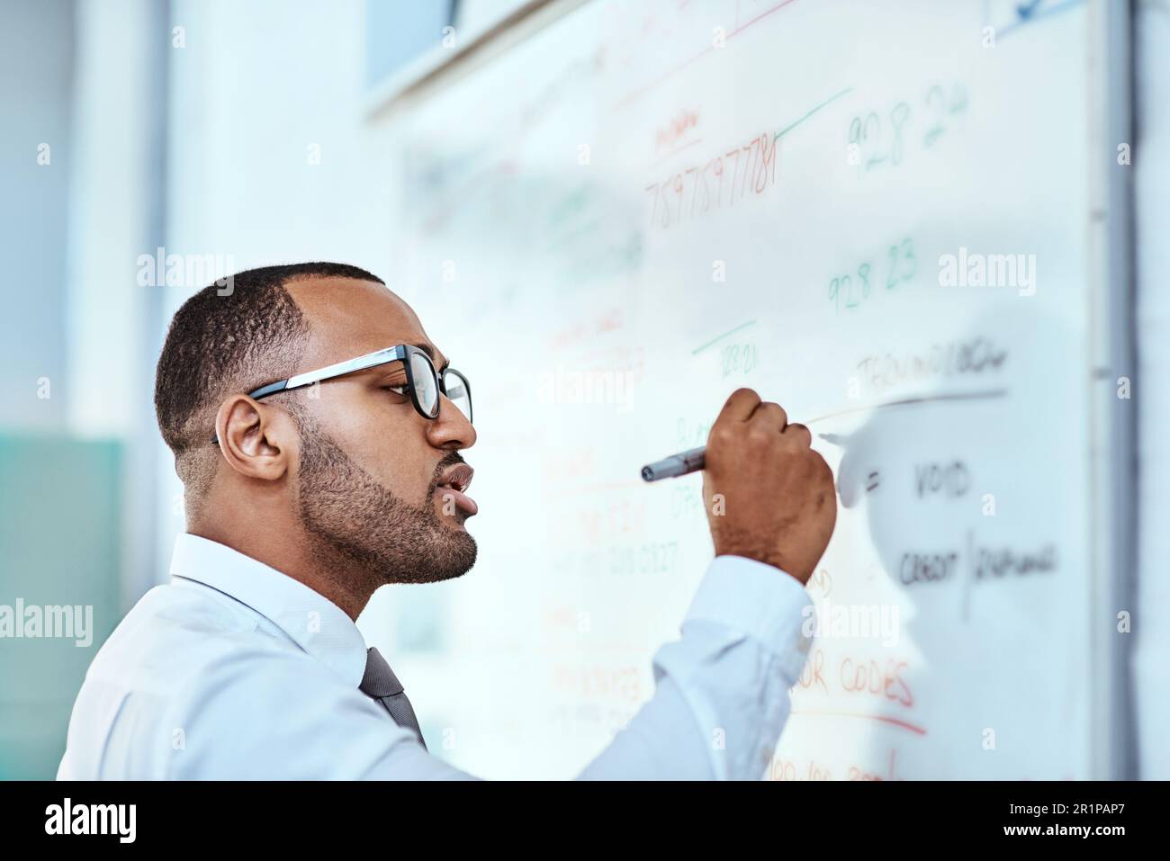 Business man, writing and whiteboard planning, brainstorming and ...