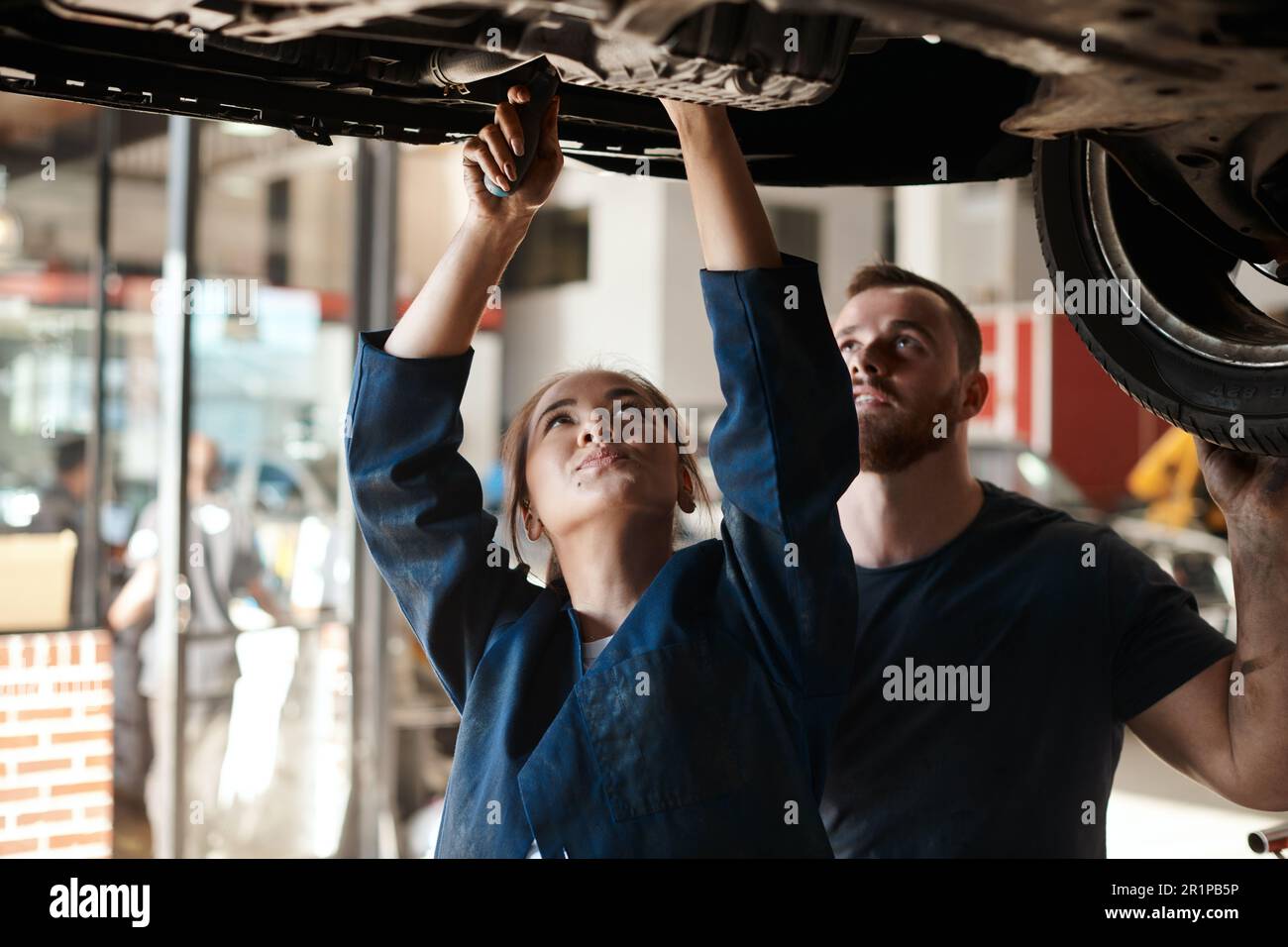 Its only her first day but shes already doing great. two mechanics ...