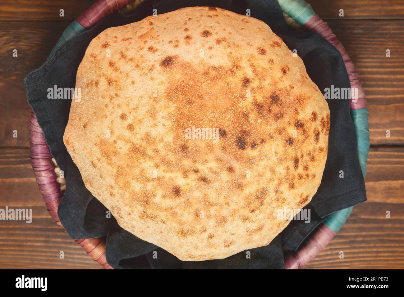 Egyptian traditional bread "Aish Baladi". This vegan bread is a mixture ...