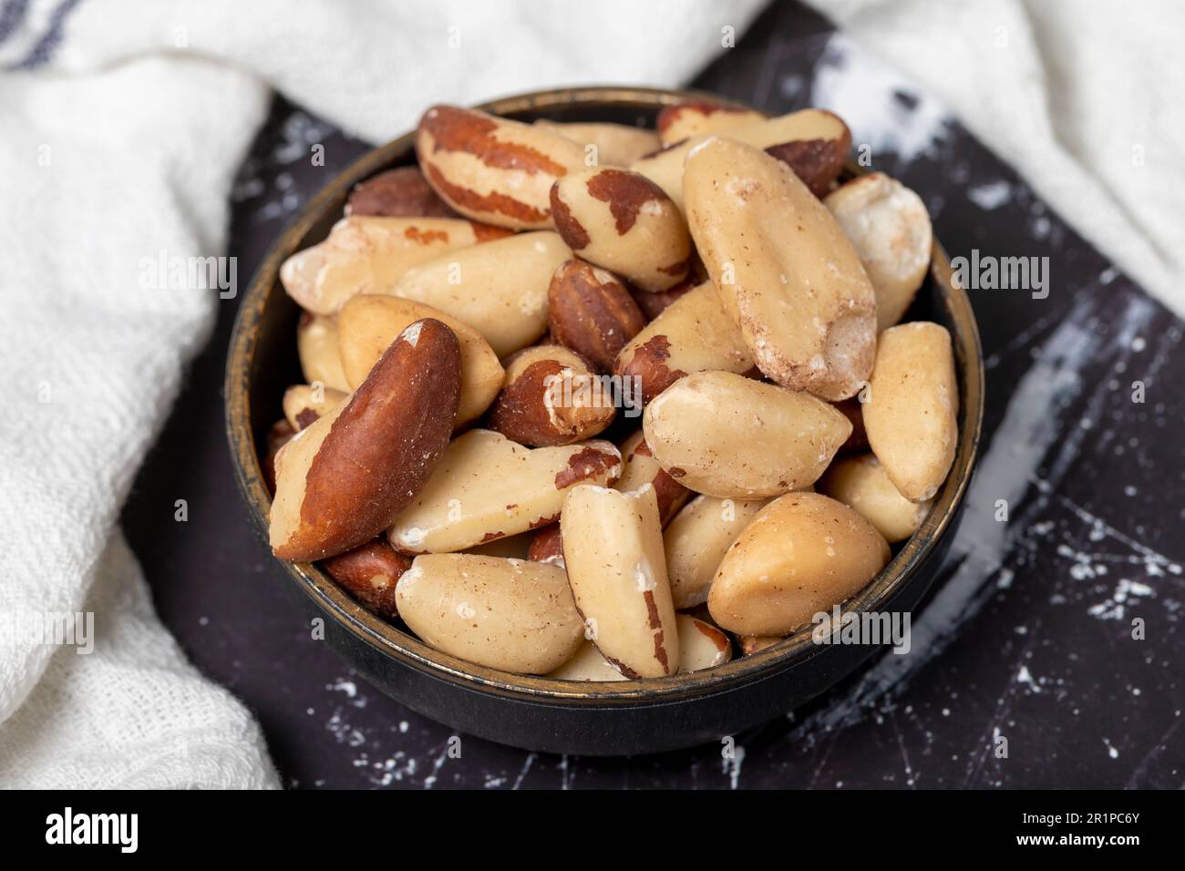 Brazil nut. Brazil nut in wooden bowl. Superfood. Vegetarian food ...