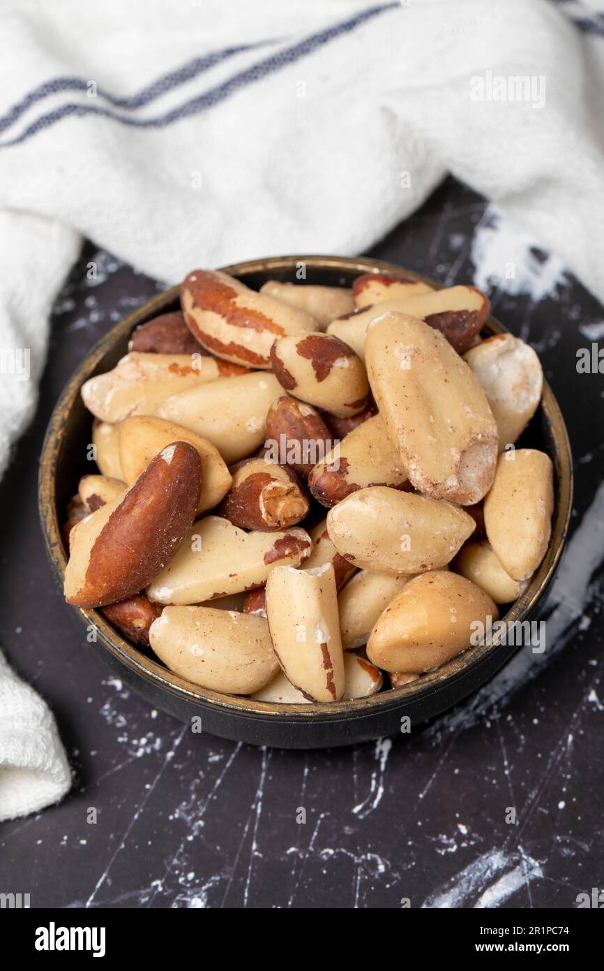Brazil nut. Brazil nut in wooden bowl. Superfood. Vegetarian food ...