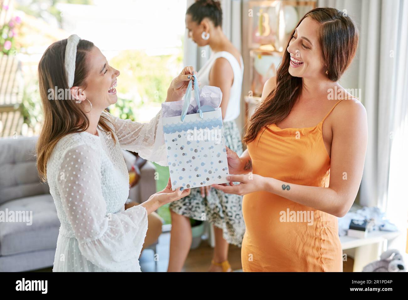 Happy pregnancy mommy to be. a pregnant mother to be receiving gifts ...