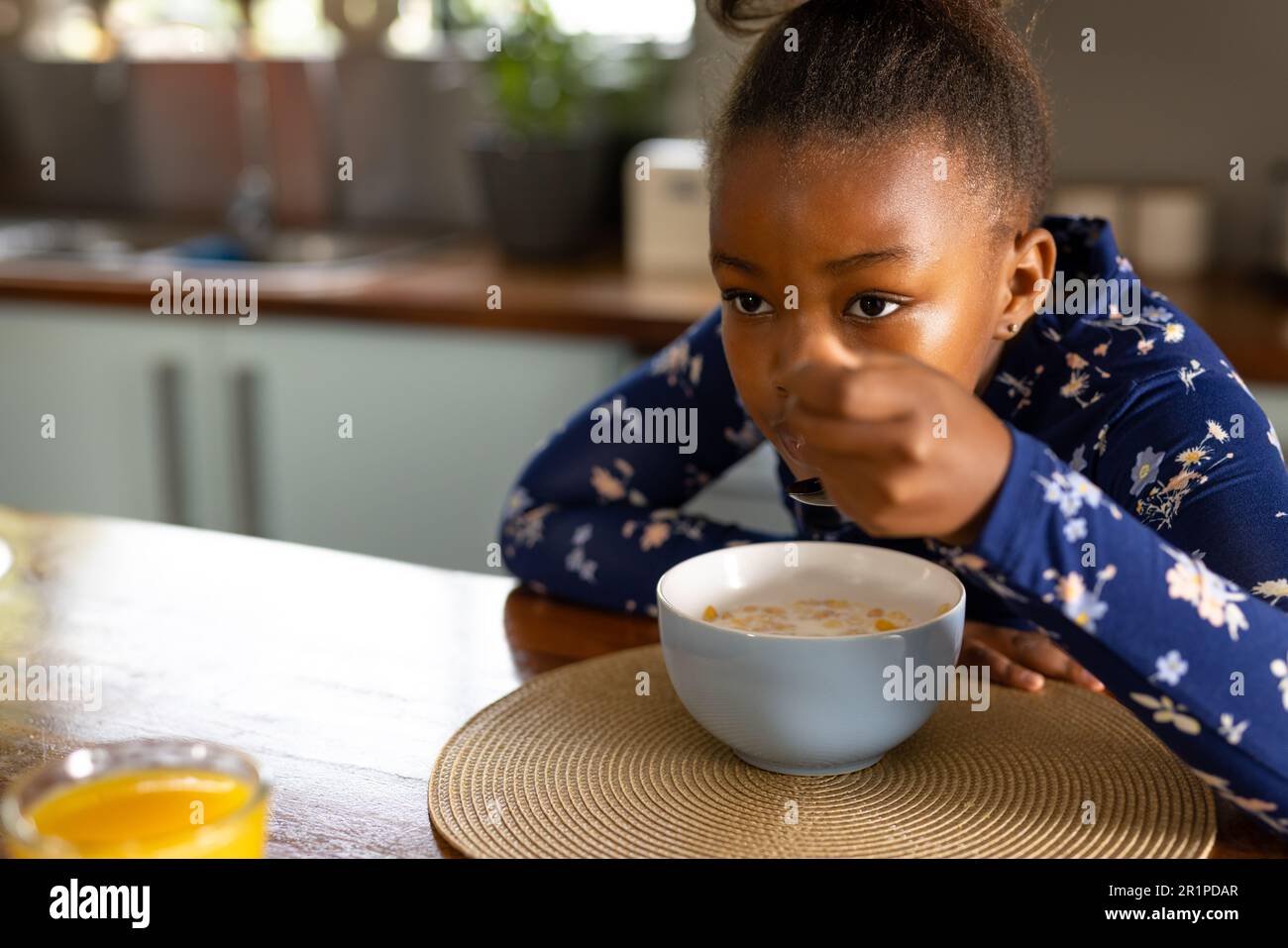 Black Child Eating Breakfast