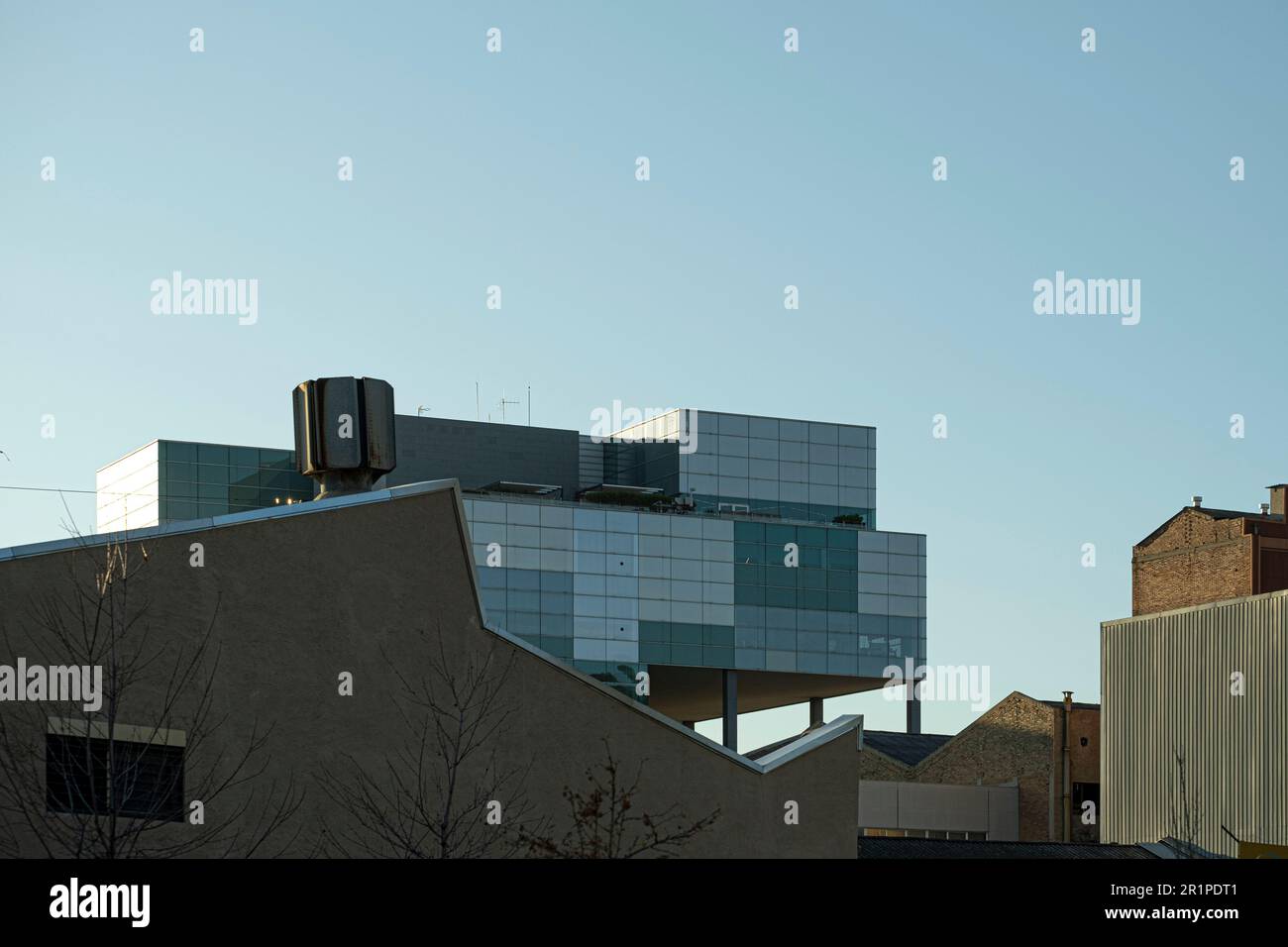 modern office buildings and old warehouses in an industrial area Stock ...