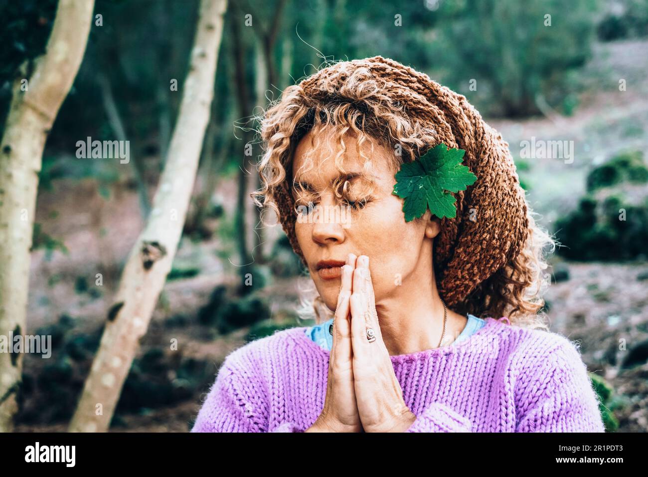 Forest, woman, meditate, eyes closed, portrait Stock Photo - Alamy