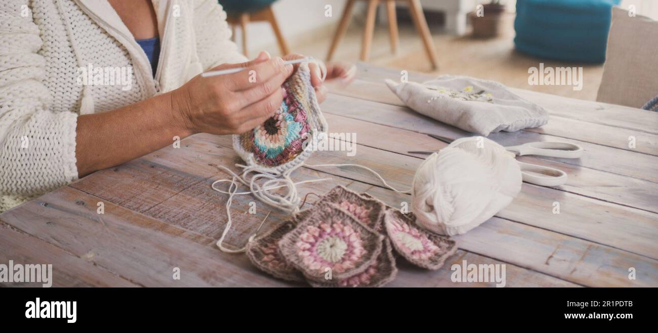 Detail woman sitting table hi-res stock photography and images - Alamy