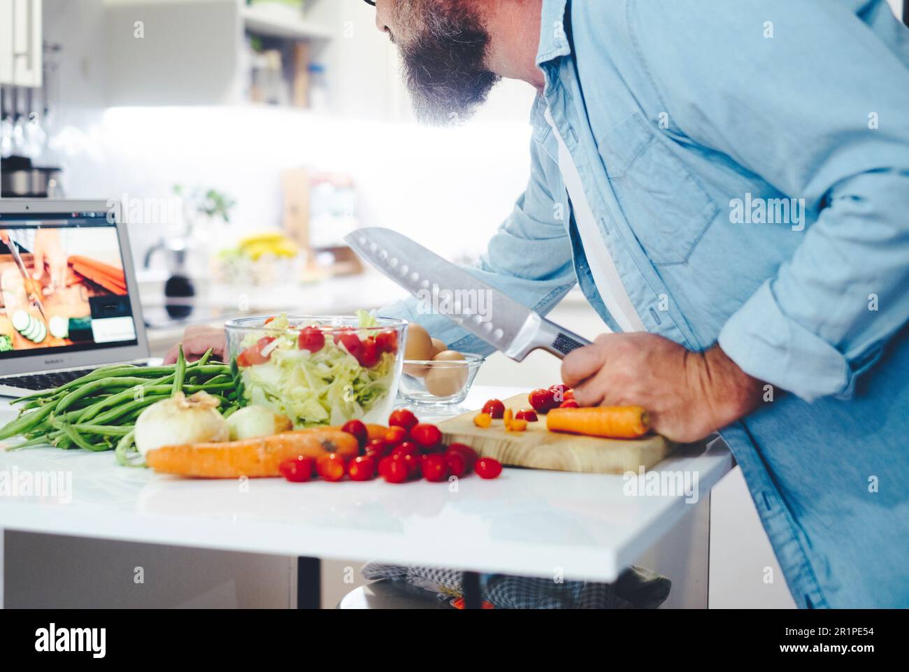 Kitchen, man, cooking, laptop, instruction, tutorial, detail Stock ...
