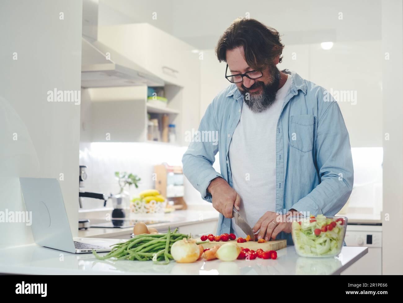 Kitchen, man, cooking, laptop, instruction, tutorial, portrait Stock ...