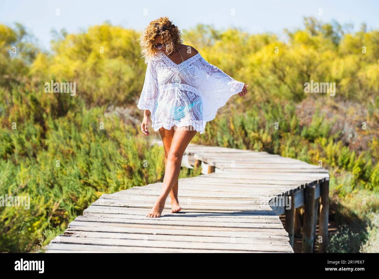 Landscape, Way, Woman, Barefoot, Happy, Sunny, vacation Stock Photo - Alamy