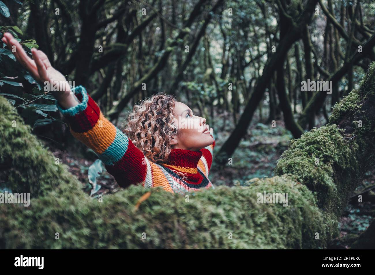 Woman celebrating nature lifestyle and outdoor leisure activity alone ...