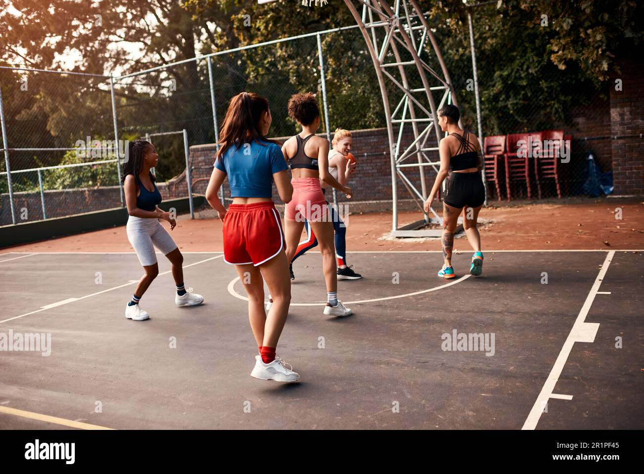 They have a good defence. a diverse group of sportswomen playing a ...