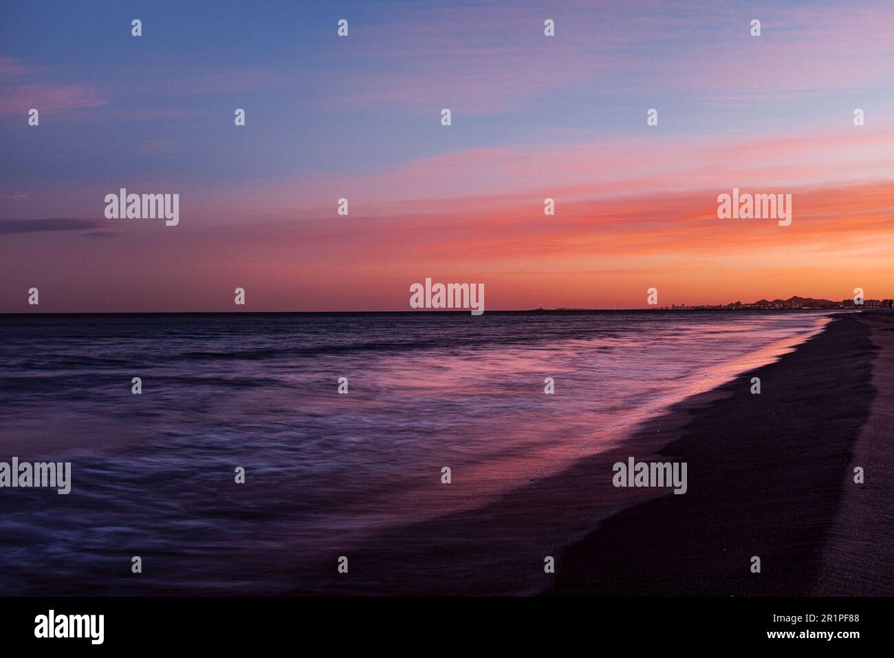 Moody calm sea landscape with long exposure water movement and waves ...