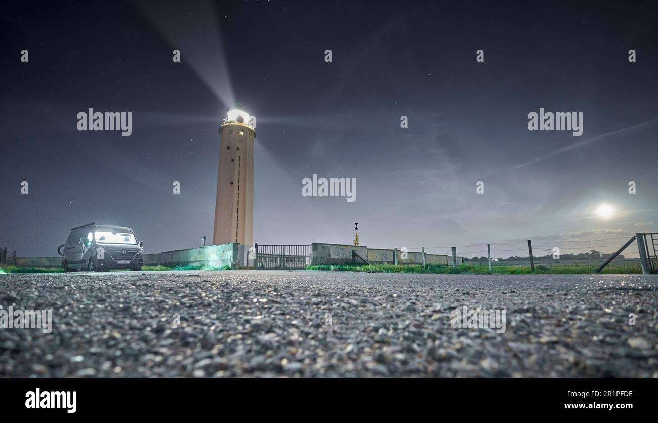 France, Normandy, Antifer lighthouse, full moon at night, campervan ...