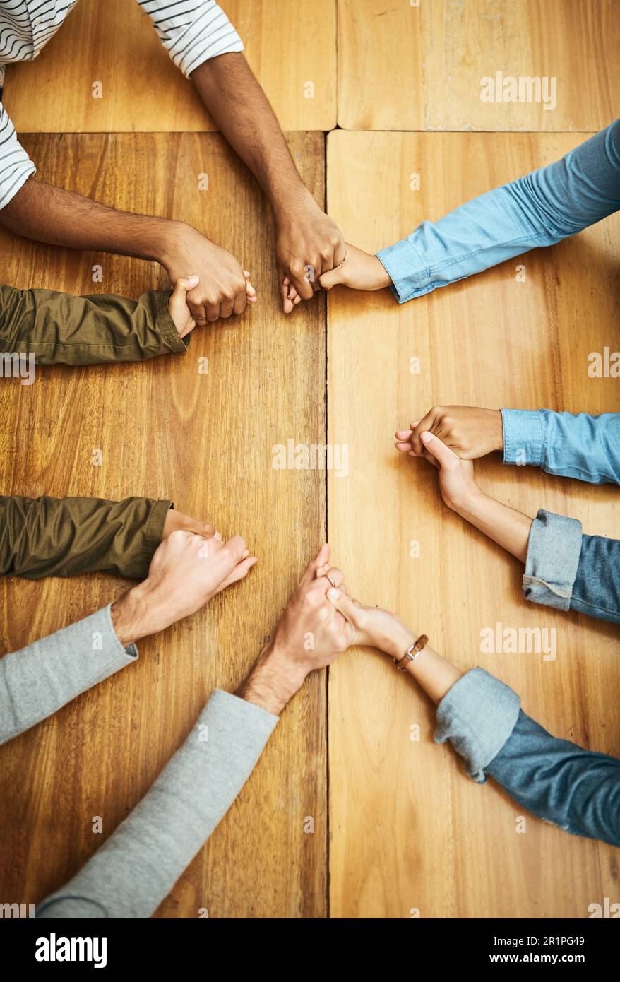 Hands holding, support and people planning together for prayer circle, love and care in a team ...