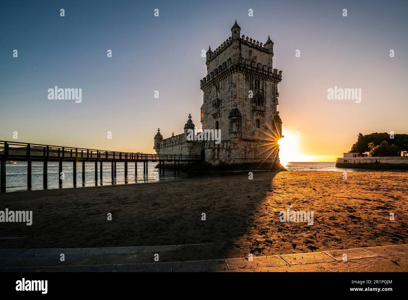 The watchtower Torre de Belém stands in the estuary of the river Tagus ...