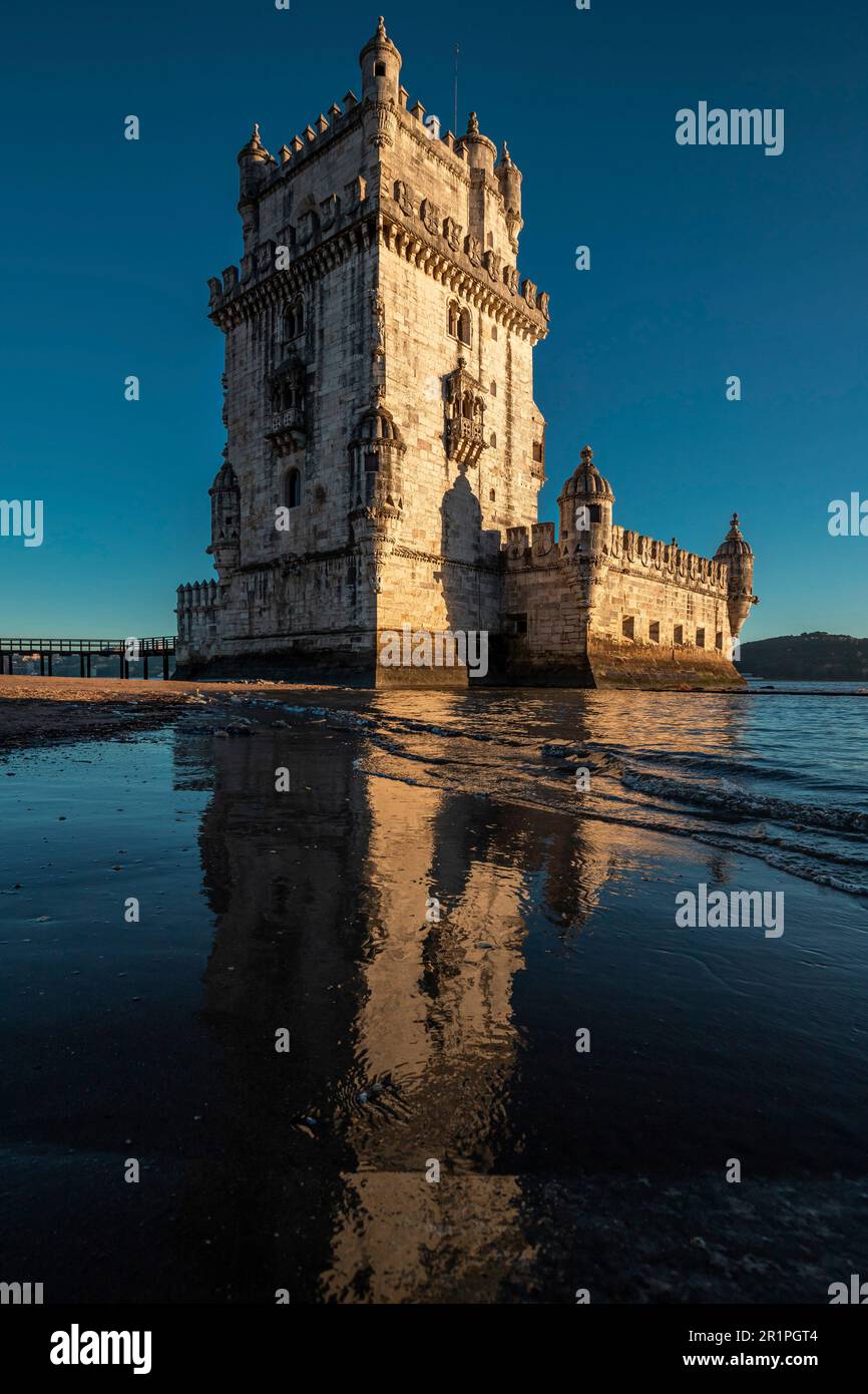 The watchtower Torre de Belém stands in the estuary of the river Tagus ...