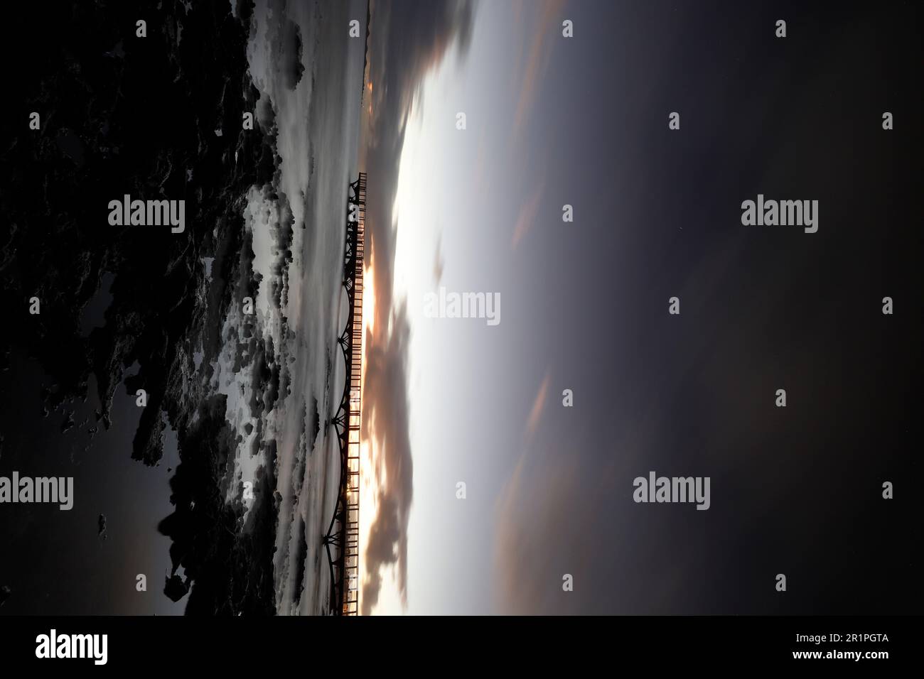 Long exposure on stony beach with jetty pier on fuerteventura hi-res ...
