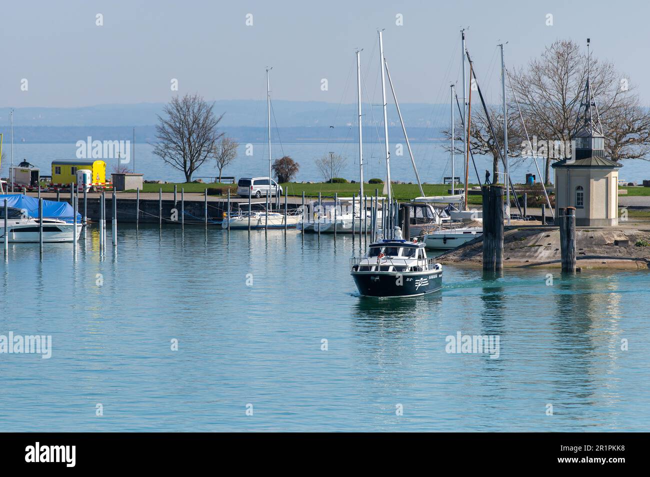 An idyllic scene of multiple sailboats in Bodensee Lake harbor in ...