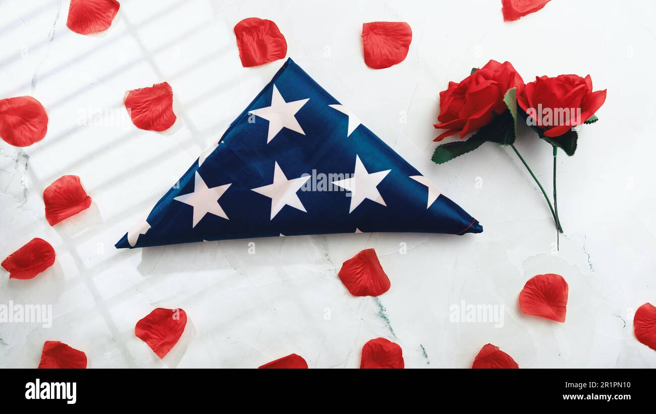 American Flag Folded Into A Triangle Stock Photo - Alamy