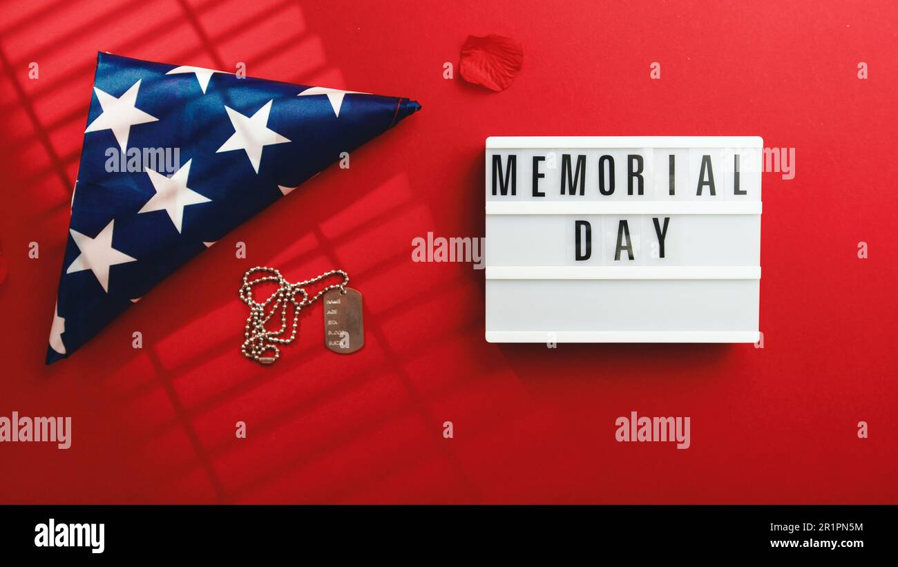Memorial day sign on red background Stock Photo - Alamy