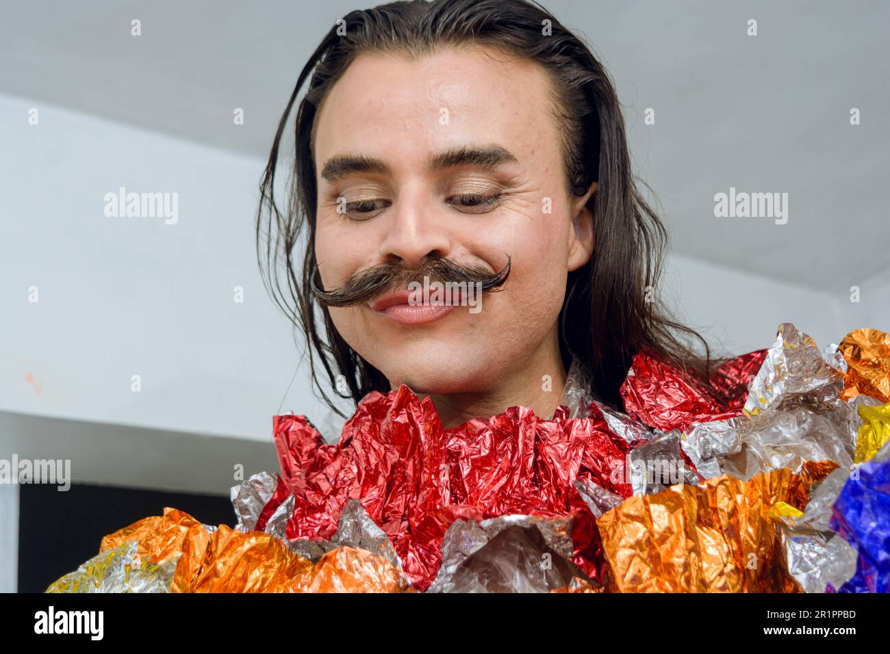 portrait of young latino person of non-binary gender and argentinian ...