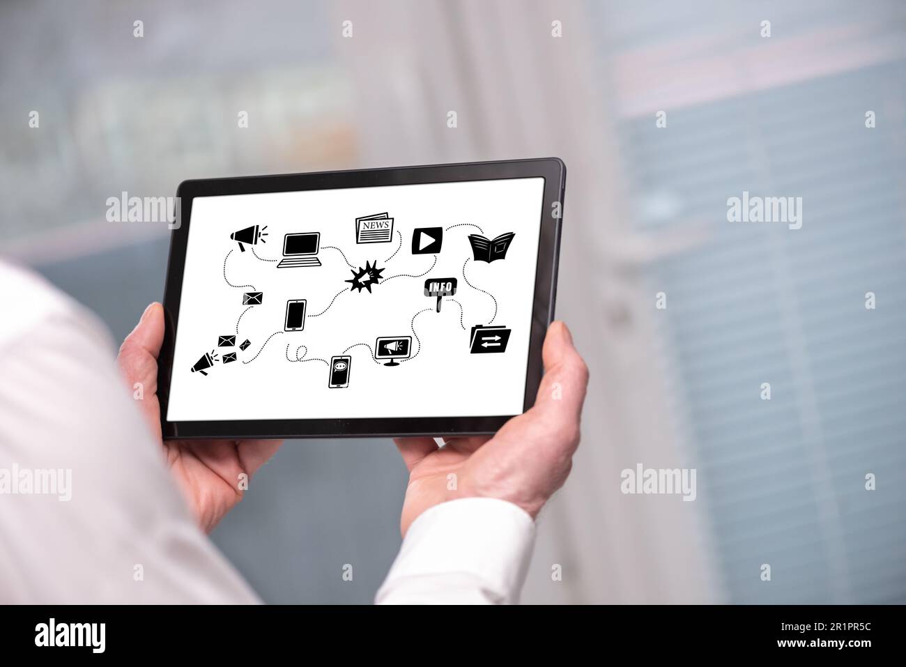 Communication media concept shown on a tablet held by a man Stock Photo ...
