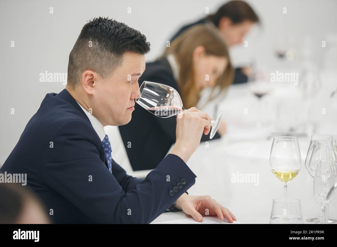 Sommelier passes training for get the certification. Wine waiter school ...