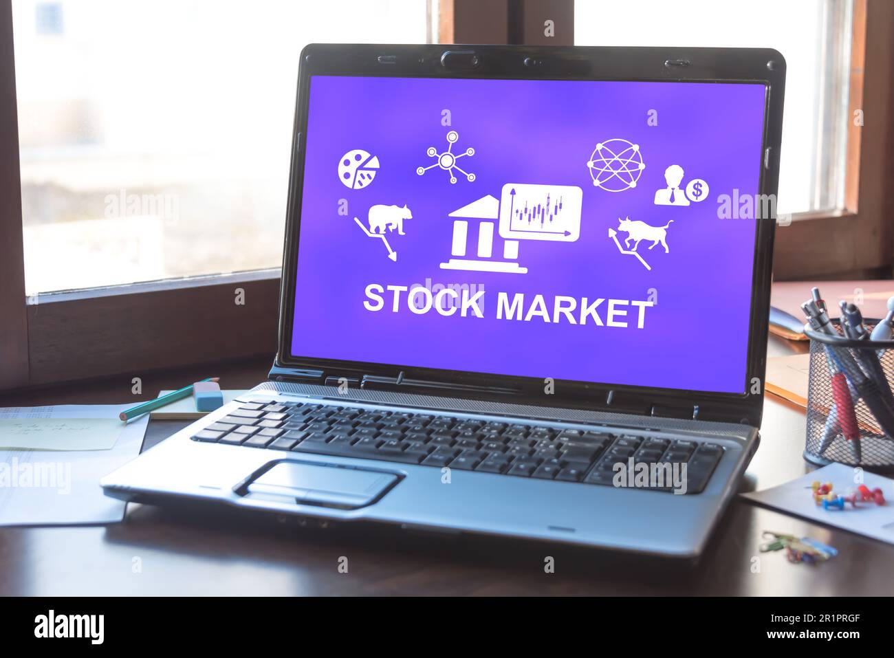 Laptop screen displaying a stock market concept Stock Photo - Alamy
