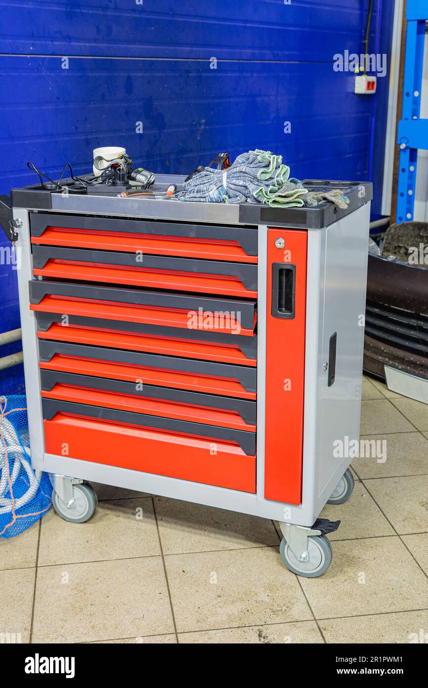 Tiered toolbox with tools in auto repair shop. High quality photo Stock ...