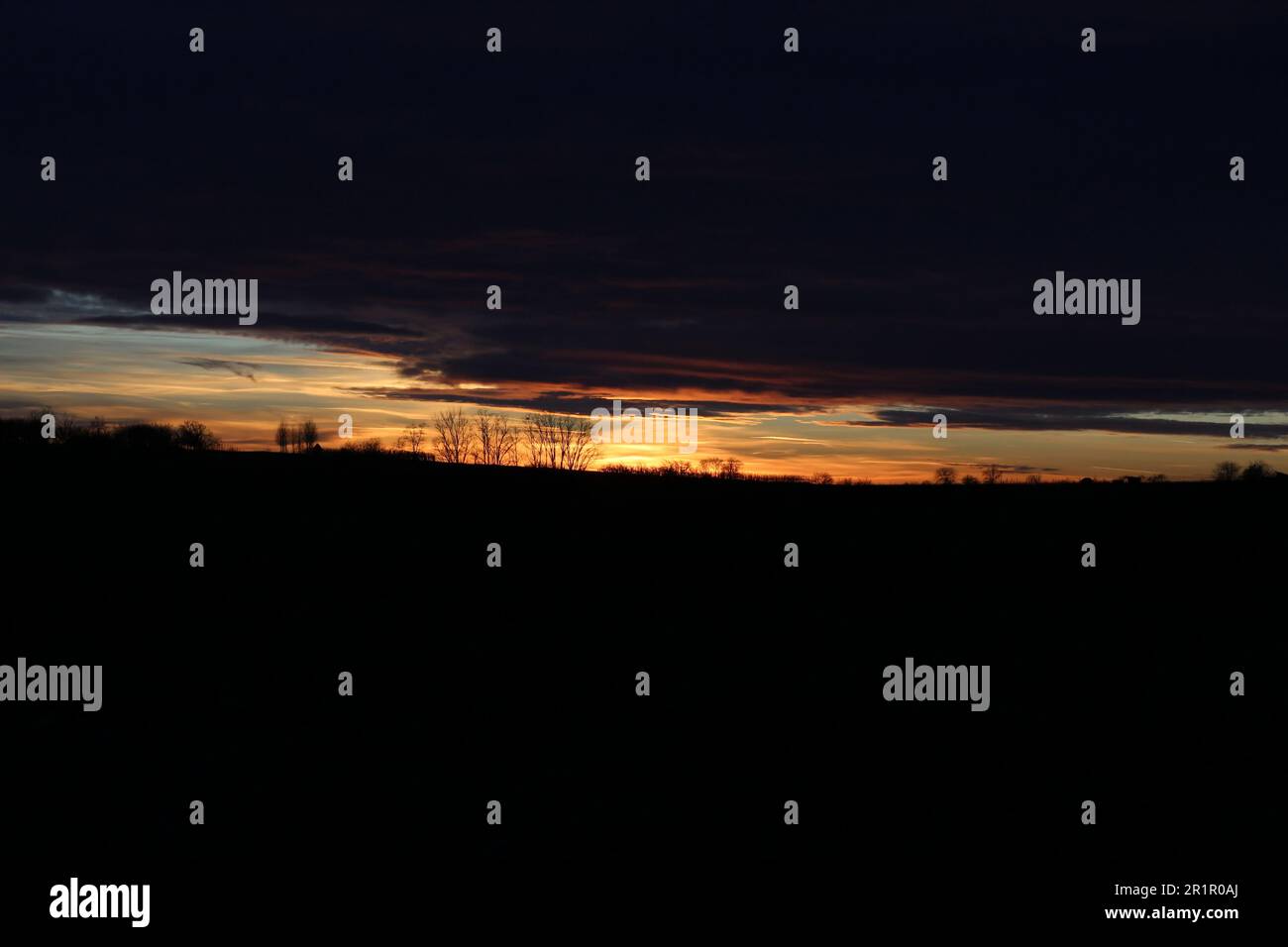 Golden hour with distant nature Stock Photo - Alamy