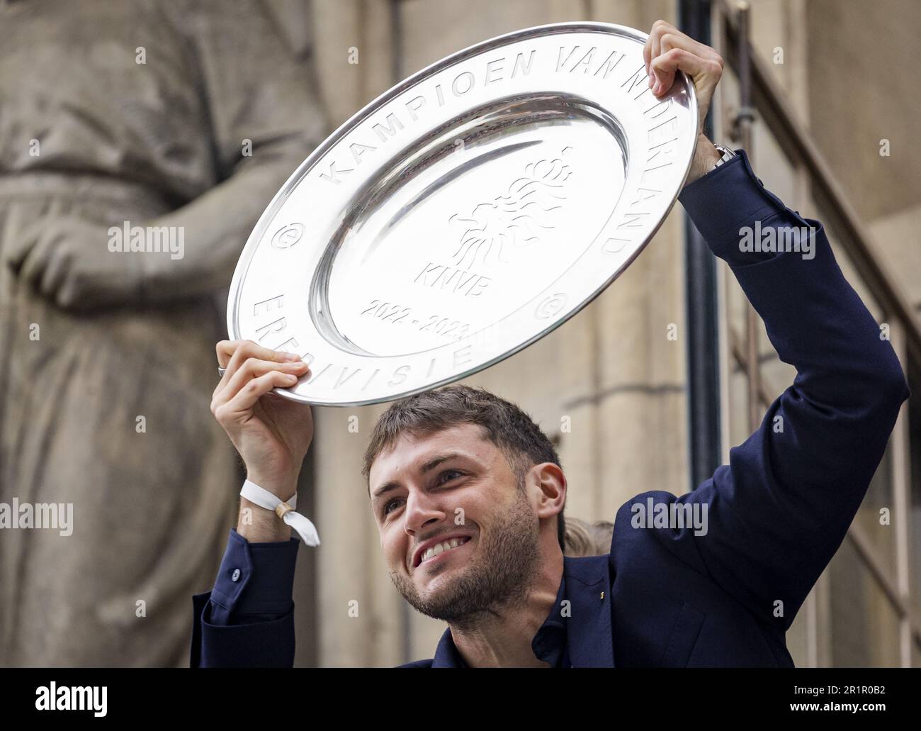 ROTTERDAM - Santiago Gimenez with the champion's plate on the balcony ...