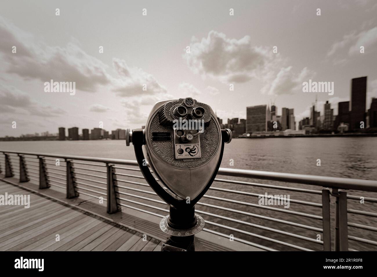 Close up historical coin operated binoculars in front of New York City ...
