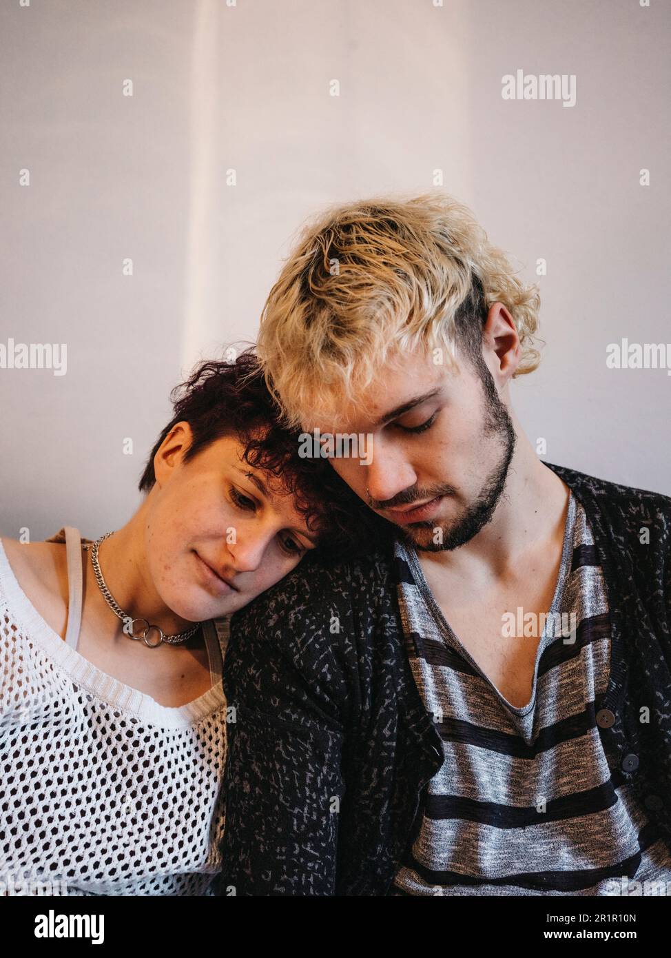 Couple lovers leaning on hi-res stock photography and images - Alamy