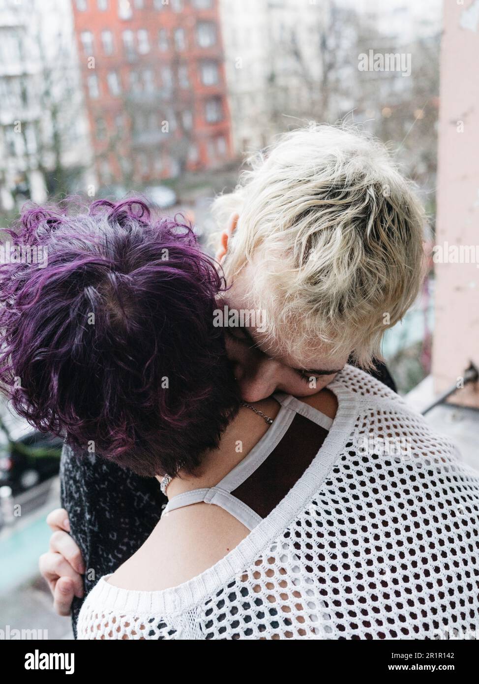 Non binary couple on balcony hi-res stock photography and images - Alamy
