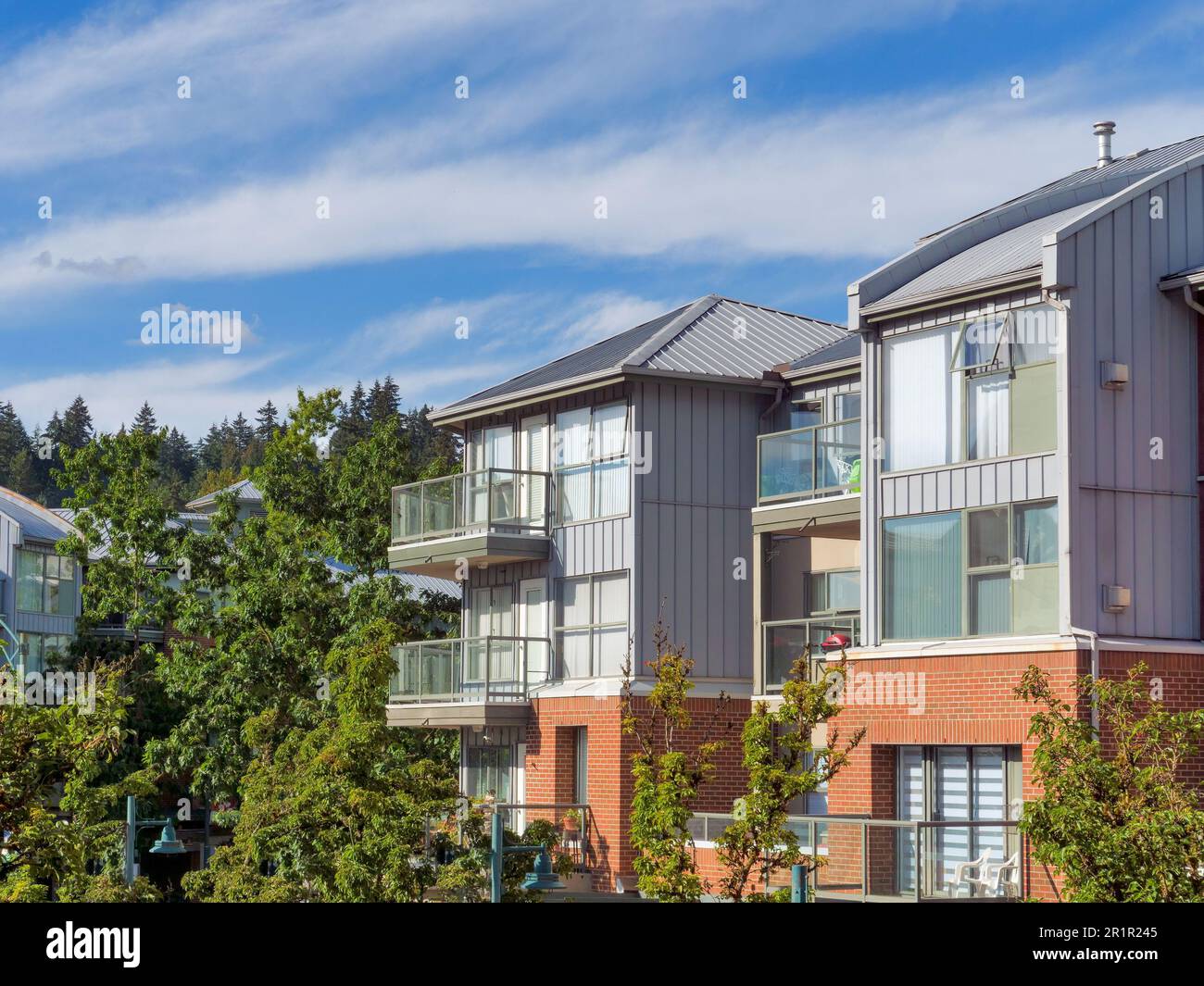 Top of residential low-rise building on cloudy sky background Stock ...