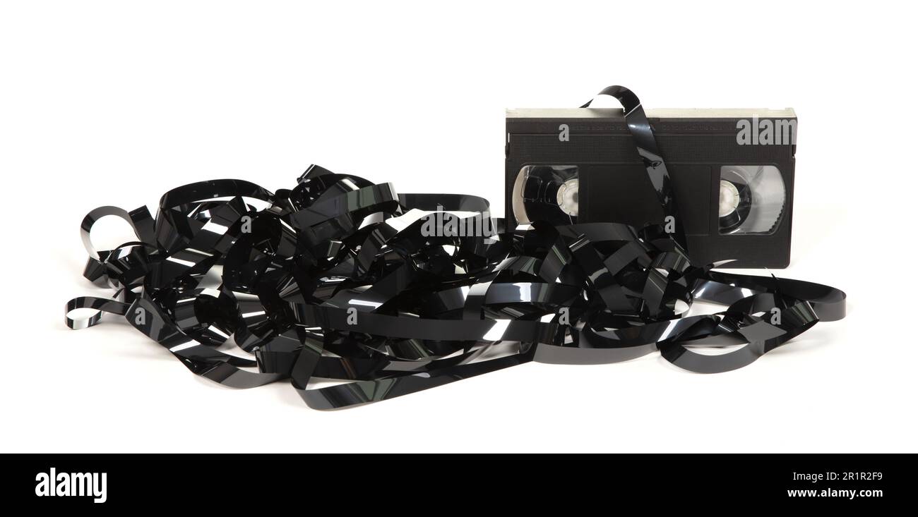 Broken video tape isolated on a white background Stock Photo - Alamy