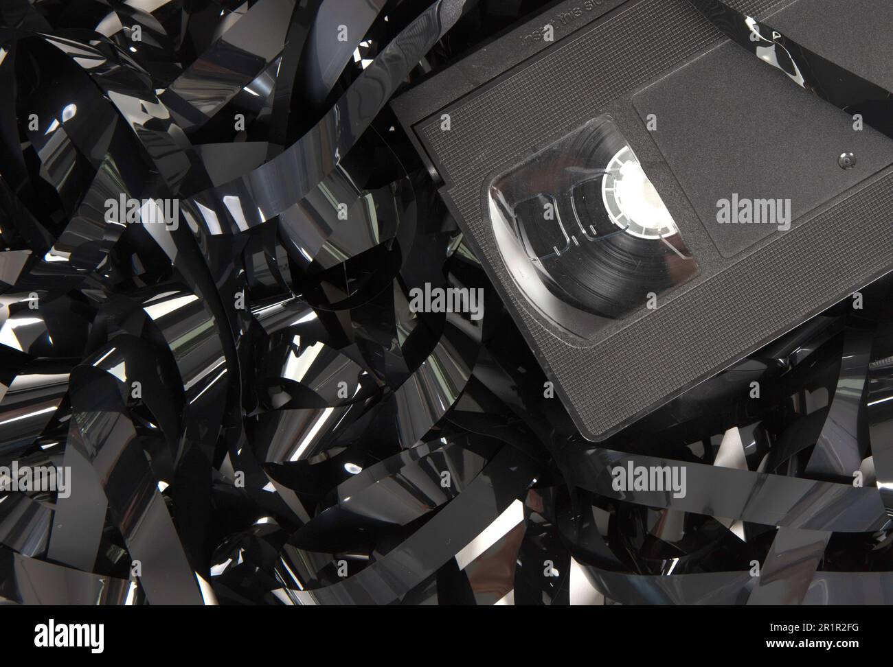 Broken video tape isolated on a white background Stock Photo - Alamy