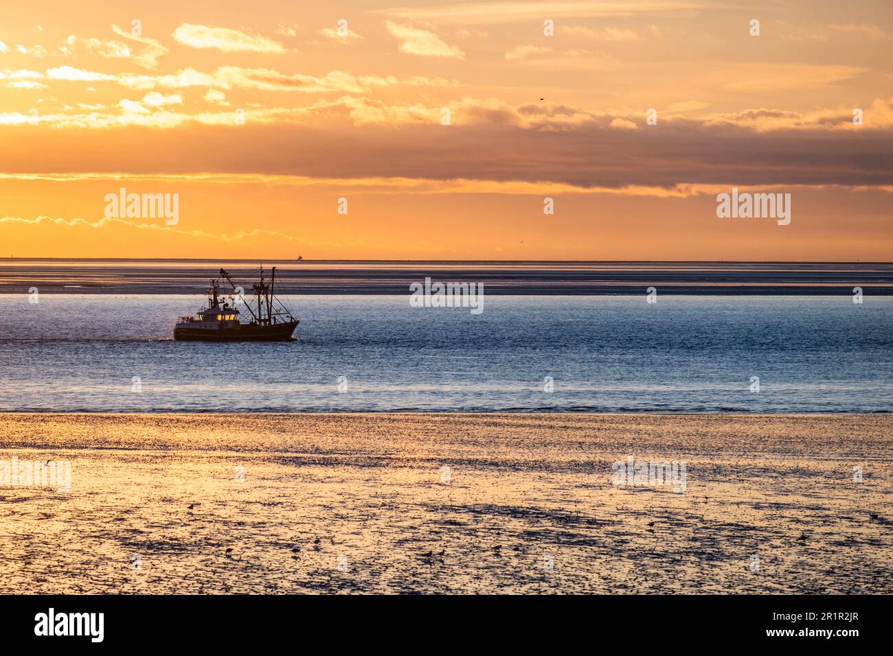 Ship in the sunset on the beach of Büsum, Büsum, North Sea, Schleswig ...