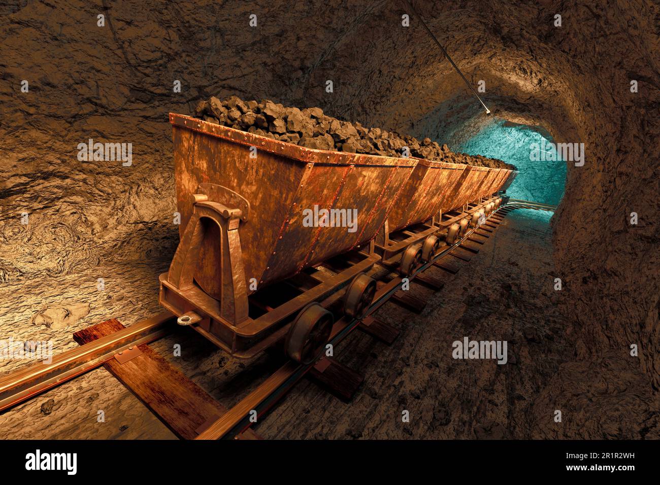 Seven old mine wagons or carts full of coal slowly moving through the ...