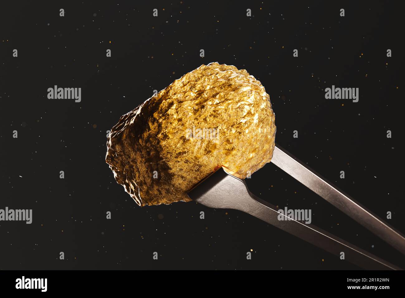 A close up on a pure shiny gold piece held by a tweezer. Expensive ...