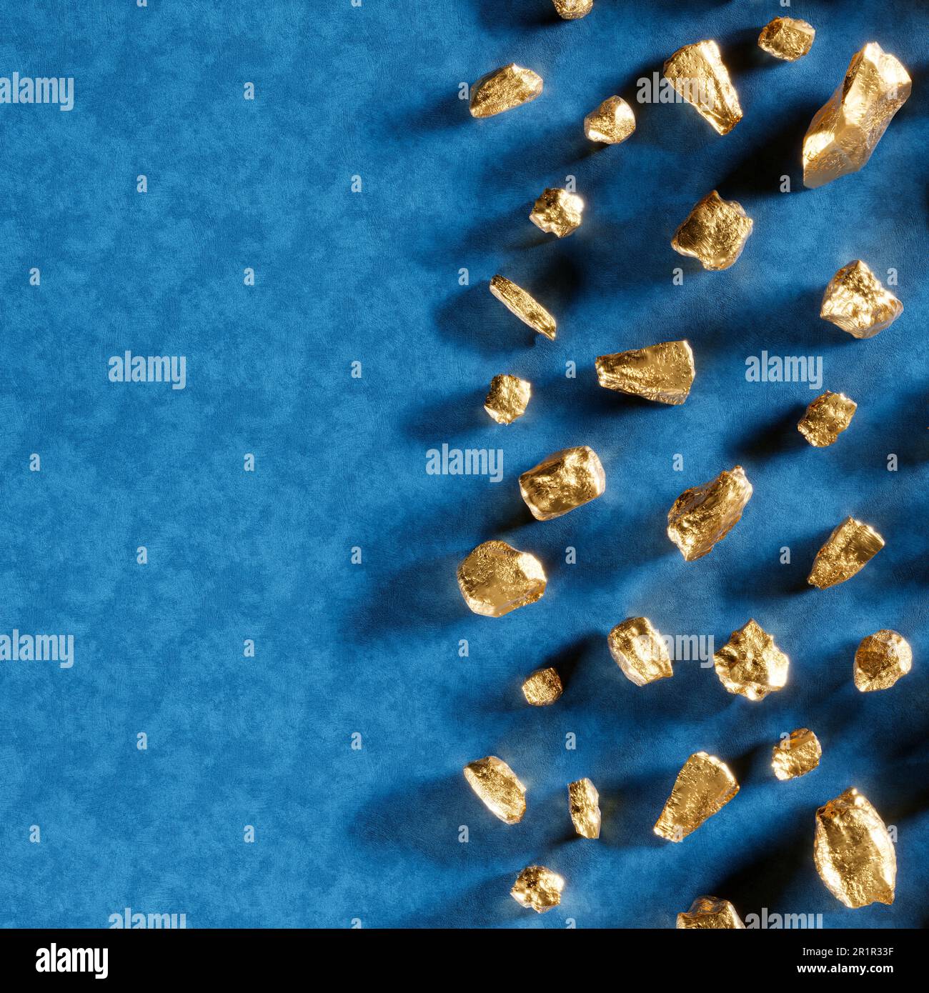 An endless number of gold pieces on the rough background. Expensive ...