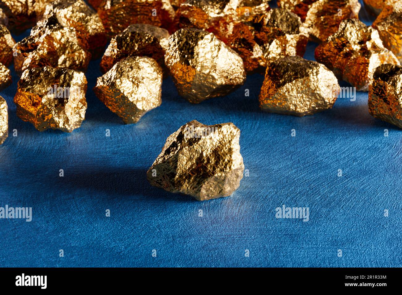 A group of pure shiny gold pieces on the rough background. Expensive ...