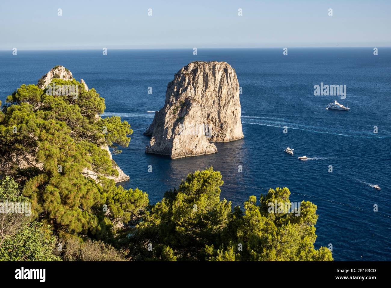Yachts and sailboats in front of Faraglioni Rock, Capri, Capri Island ...