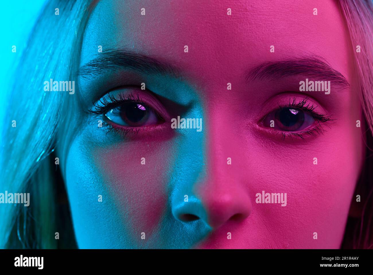 Close up portrait of young charming girls face with big beautiful eyes ...