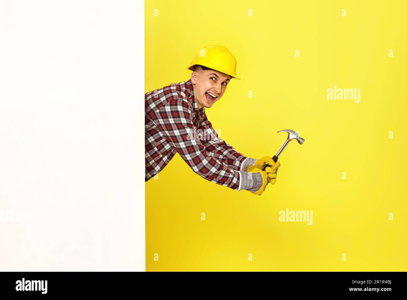 Young workman hammer hi-res stock photography and images - Alamy