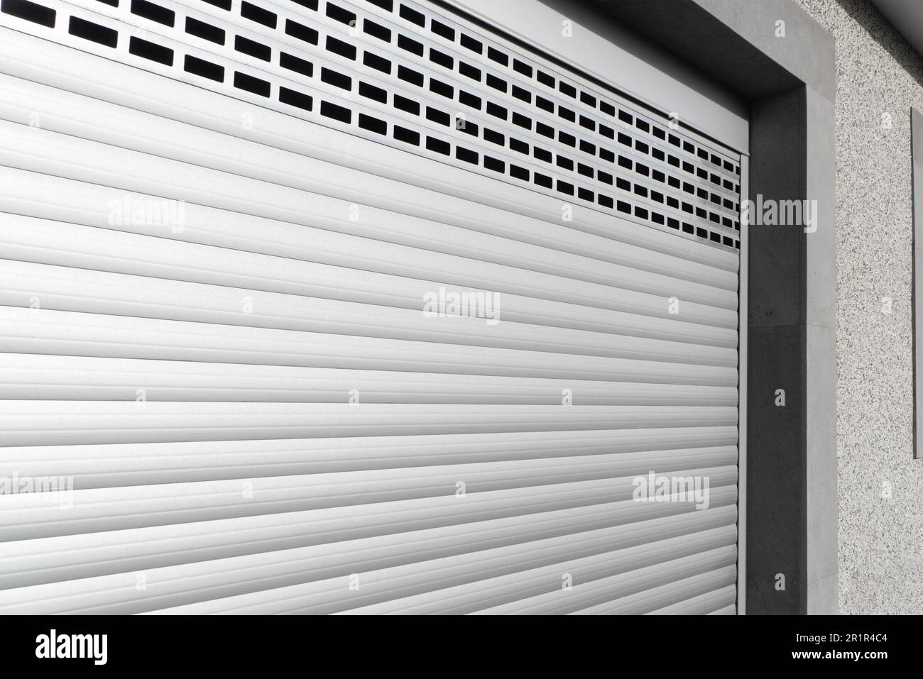 Roller shutter gate. Metal roller garage door as background. Automatic ...